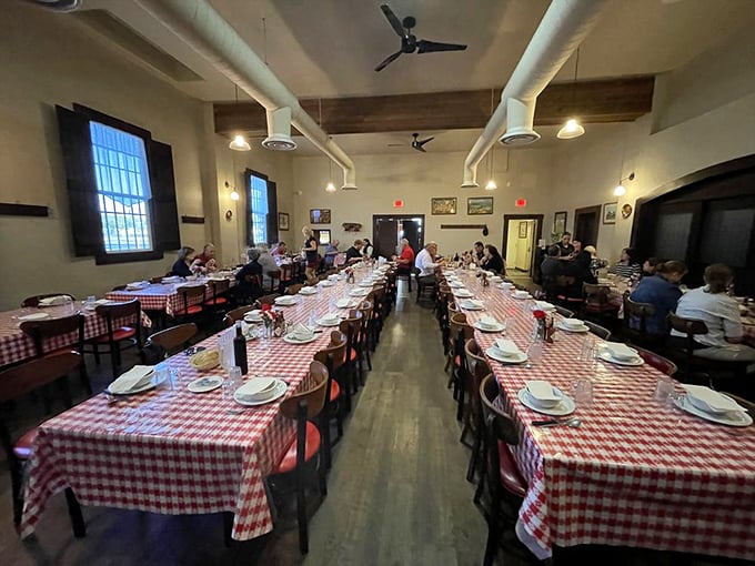 Dining room democracy in action – long tables where farmers, road-trippers, and food pilgrims gather for the shared religion of good eating.