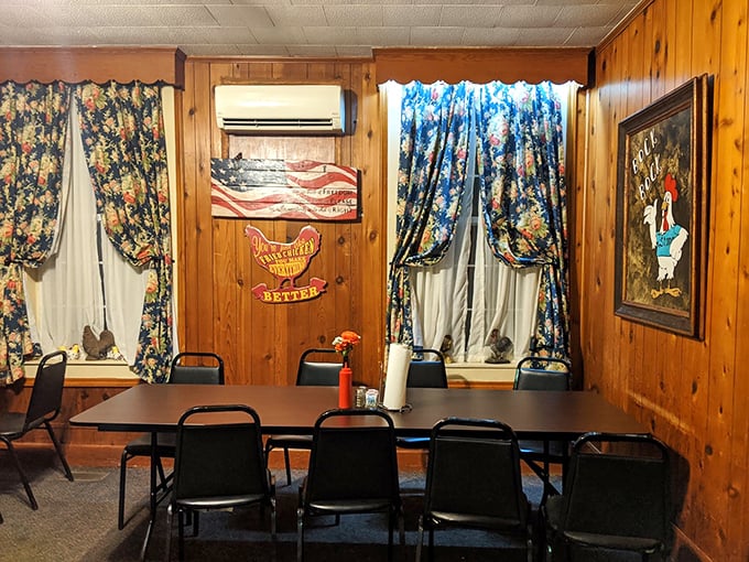 Wood-paneled walls, floral curtains, and patriotic decor—dining here feels like Sunday dinner at your favorite aunt's house.