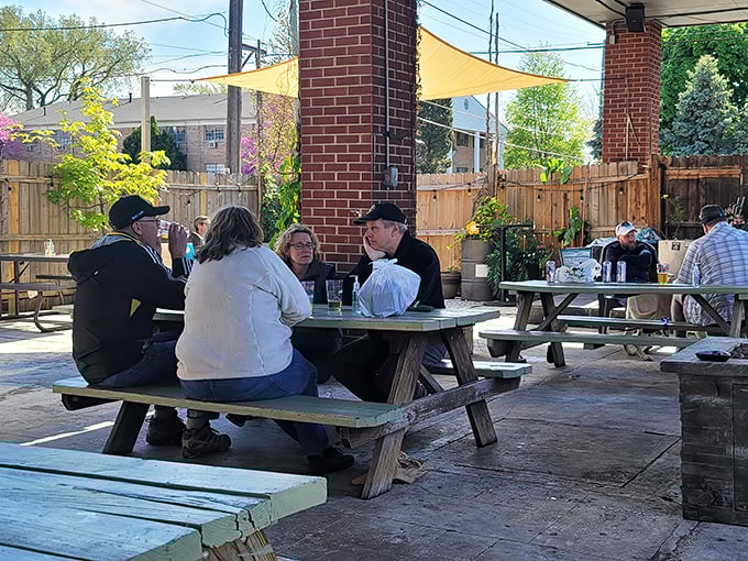 The outdoor dining area where strangers become friends united by the universal language of "mmm" and "pass the napkins, please."