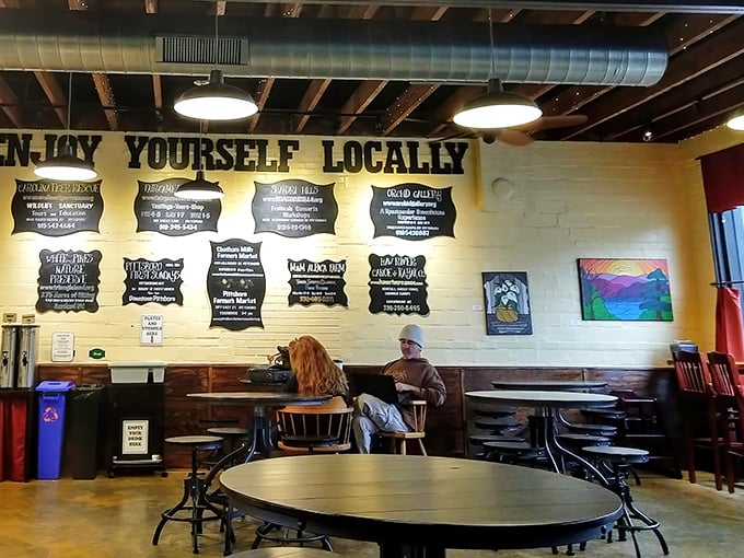 "Enjoy Yourself Locally" isn't just wall art—it's the Phoenix philosophy, creating a space where coffee, conversation, and community naturally blend.