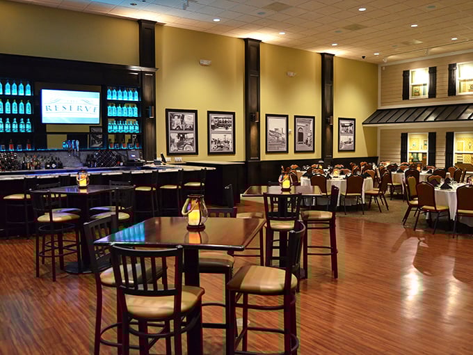 Another dining space where warm lighting meets classic décor. Black and white photos on yellow walls tell stories of Maryland's rich maritime history.