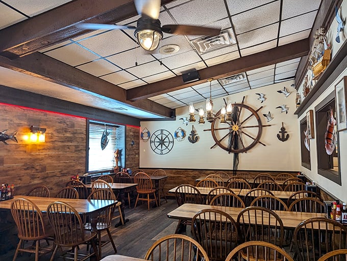 Nautical wheels and anchors adorn walls where countless seafood pilgrimages have ended in satisfied sighs and loosened belts.