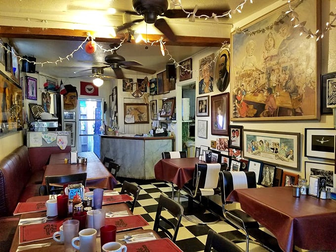 Every surface tells a story in this dining room. The ceiling fans aren't just moving air – they're circulating decades of conversations and coffee aromas.