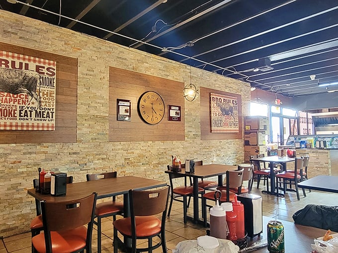 Brick walls, wooden accents, and BBQ wisdom on the walls—the dining room at A.B.'s feels like the living room of that friend who always feeds you too well.