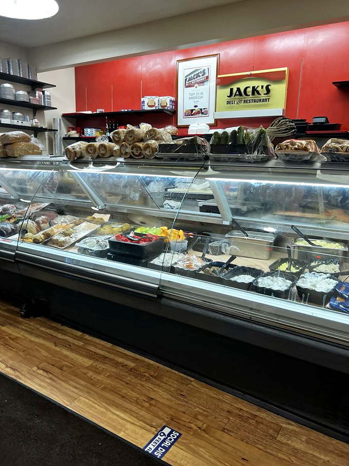 The deli case—a museum of prepared salads, meats, and treats. Like the Louvre, but with more potato salad and less security.