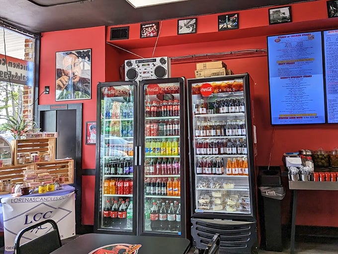The drink coolers – a rainbow of hydration options standing at attention, ready to combat the pleasant thirst that follows a perfect cheesesteak.