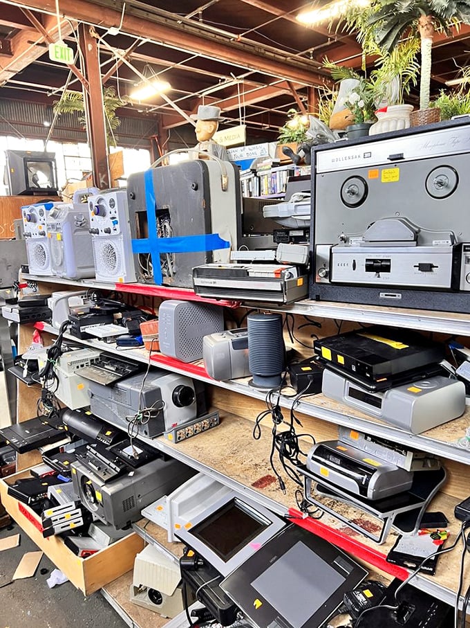 The electronics section—where vintage audio equipment awaits audiophiles who believe music just sounded better in the analog age.