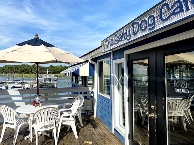 The entrance promises coastal charm with a side of harbor views – like stepping into a postcard that serves incredible seafood.
