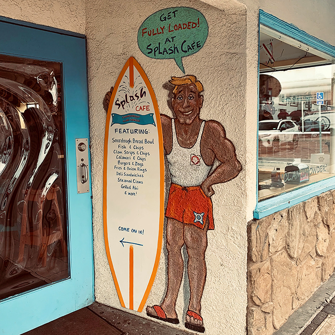 Get Fully Loaded! advises the surfer mural by the entrance, offering sage wisdom that applies equally to bread bowls and life philosophies.