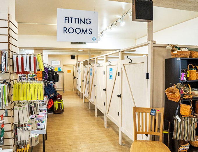 The fitting room area offers privacy and good lighting—two essentials when deciding if that designer jacket really was meant for your second act.