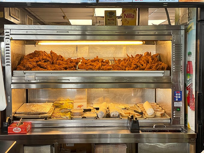 The warming station—where golden-fried treasures wait patiently for their moment to change someone's day for the better.