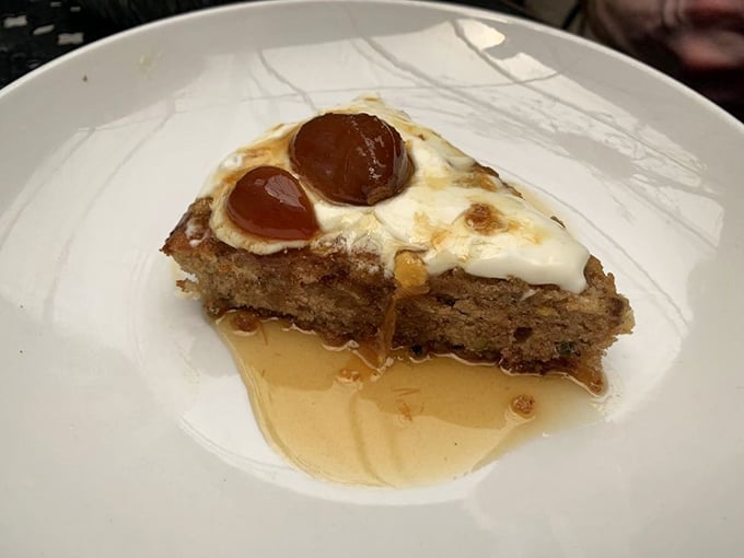 This isn't just dessert – it's a sweet finale with caramelized fruit that makes you want to applaud the pastry chef.