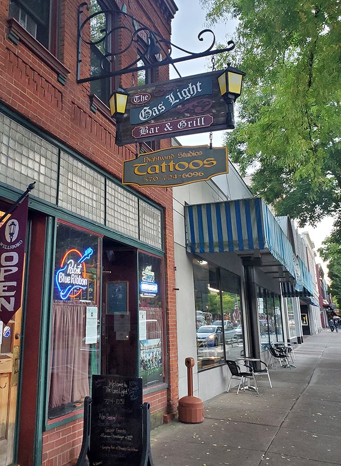 The Gas Light Bar & Grill offers classic pub atmosphere with a side of local character. That Blue Moon neon isn't lying—this place is indeed something special.