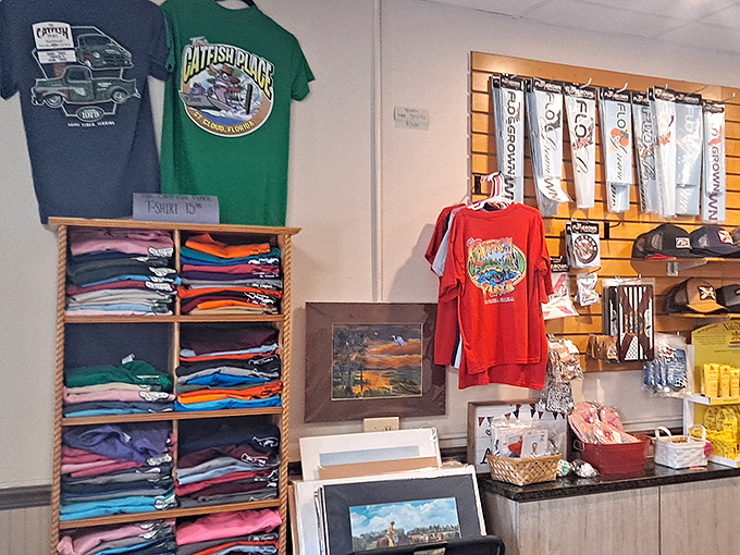 The gift shop offers t-shirts and souvenirs for those who want to take home memories that last longer than the taste of fried catfish—though not by much.