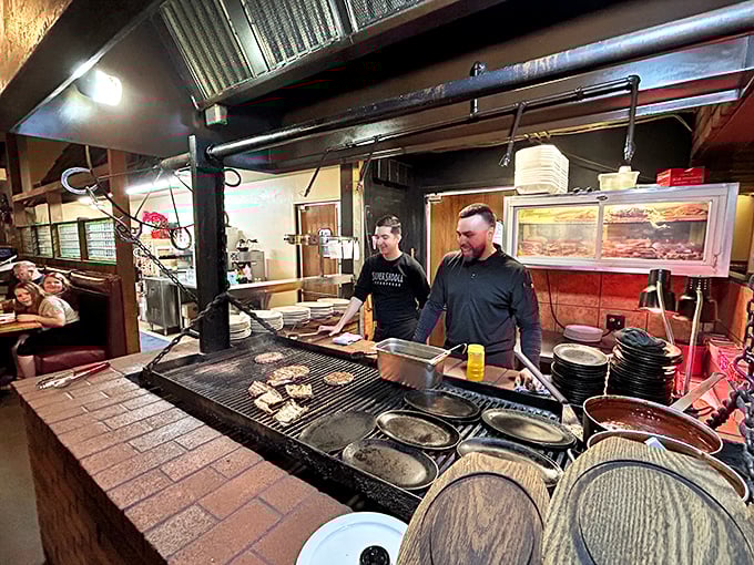 Where the magic happens – mesquite flames dancing beneath soon-to-be-legendary steaks. Fire and skill in perfect harmony.