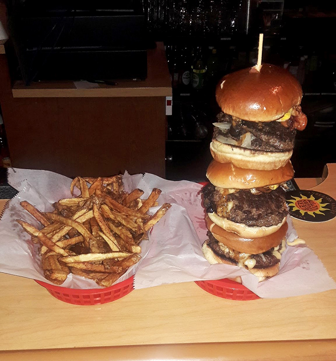 The Hall of Famer isn't just a burger—it's a skyscraper of satisfaction that requires a game plan, a napkin strategy, and absolutely no fear of heights.