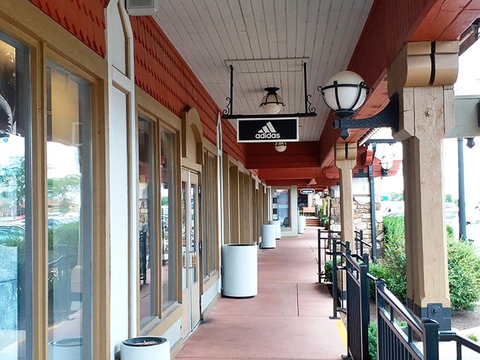 These covered walkways aren't just practical – they're the arteries connecting one retail adventure to the next, rain or shine.