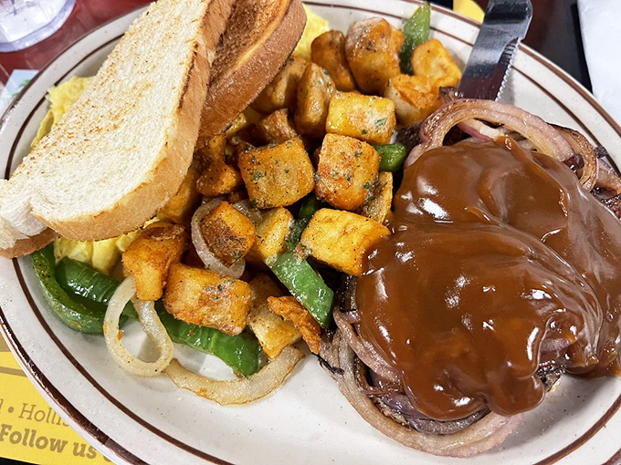 When breakfast goes formal! This hamburger steak with gravy is the morning equivalent of wearing a tuxedo to the beach – unexpectedly perfect.