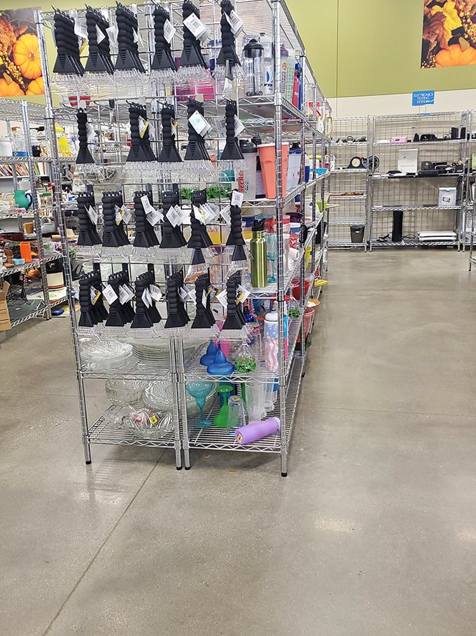 Glassware and serving pieces stacked like urban tetris—someone's wedding registry rejects become your entertaining secret weapons.