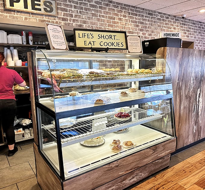 "Life's short... eat cookies" – advice worth following when faced with this display case of homemade temptations. Dessert isn't optional; it's essential life philosophy.