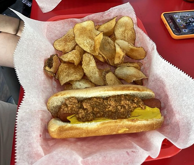 The hot dog—America's humble hero—dressed up just enough to be special but still recognizable as your childhood favorite.
