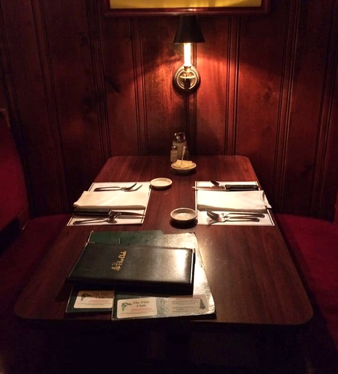 The intimate table setting says, "Something special is about to happen," and at Pine Club, that something is always worth the wait.