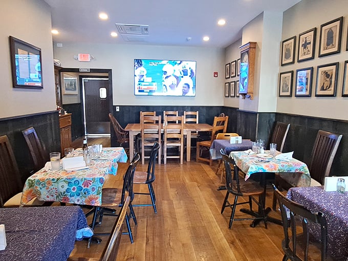Tables dressed in colorful cloths like they're ready for a celebration—because in a place this good, every meal feels special.