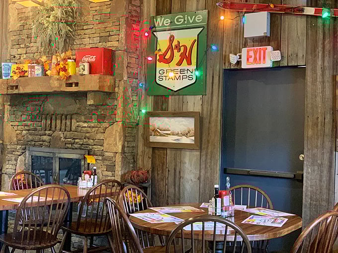 Vintage signs and twinkling lights create an atmosphere that whispers, "Slow down, stay awhile, there's pie coming."