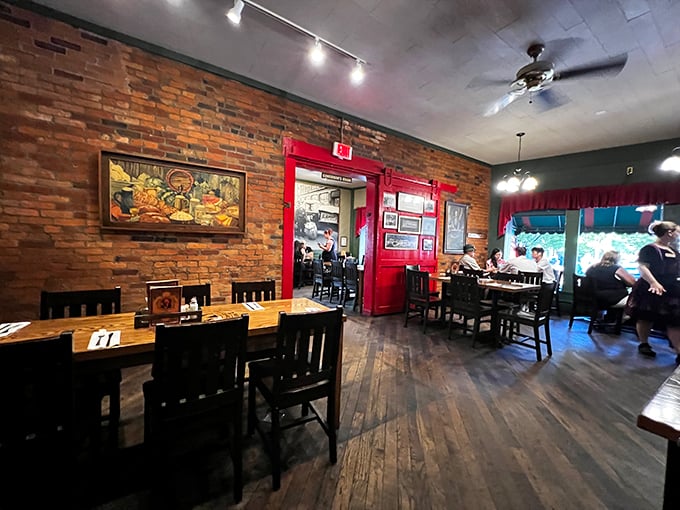 Red brick walls, wooden floors, and that striking red door—Schmidt's interior feels like stepping into a storybook version of old-world Germany. 