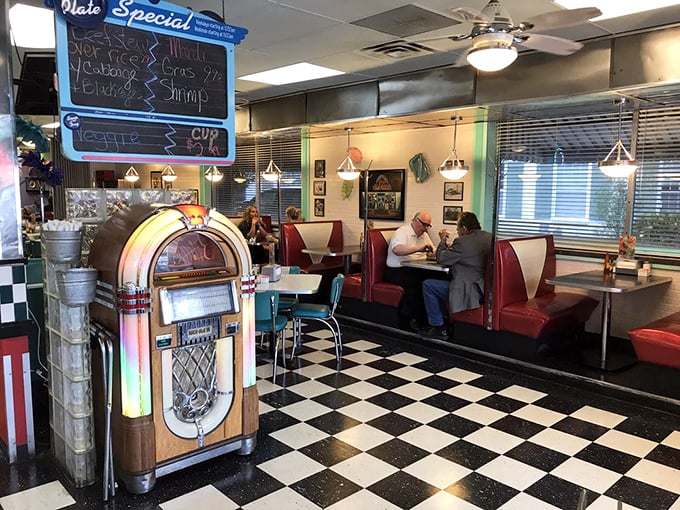 The jukebox stands sentinel in the corner, ready to provide the soundtrack to your meal while red vinyl booths invite you to slide in and stay awhile.