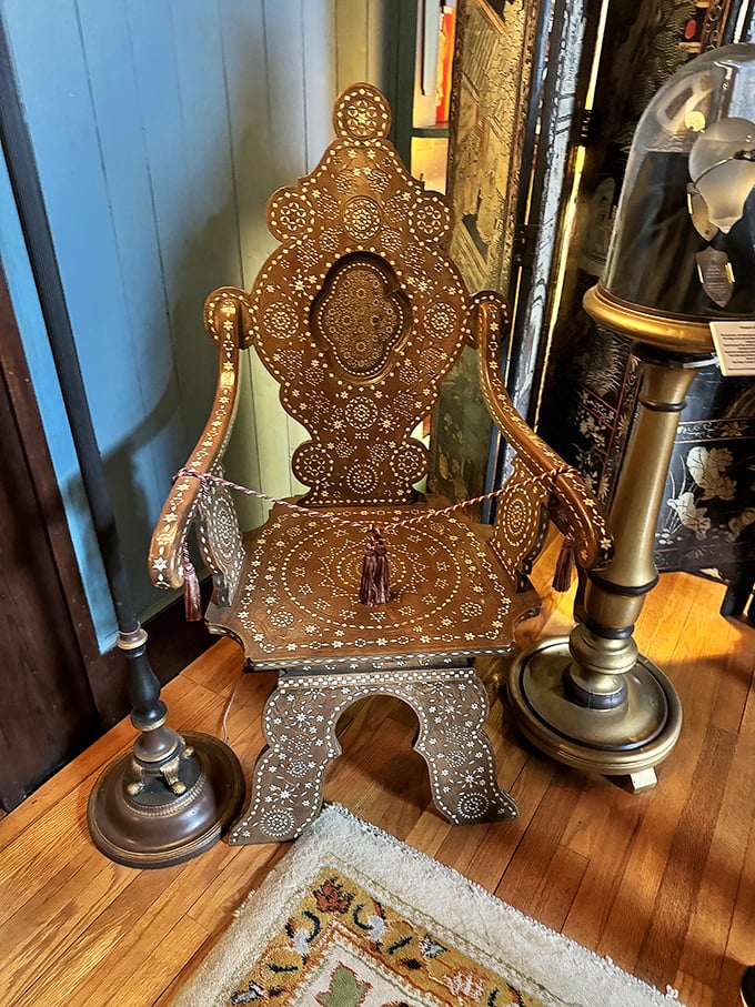 This isn't just a chair—it's a masterclass in bone inlay, where every pattern was painstakingly created by artisans who never heard of IKEA.