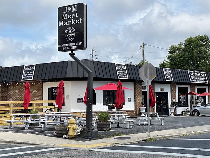 J&M Meat Market's outdoor seating area invites carnivores to enjoy their spoils al fresco—because everything tastes better with a side of fresh air and friendly conversation.