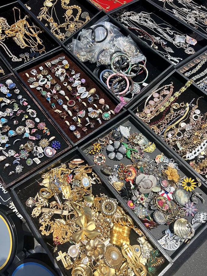 Treasure boxes of vintage jewelry where your grandmother's brooch might be hiding. Each compartment promises potential heirlooms or perfect gifts.