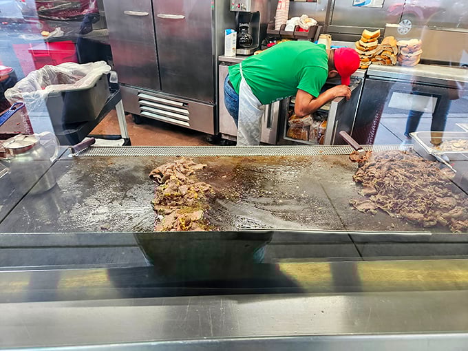 The battlefield where cheesesteak legends are born. That griddle has more seasoning than most restaurants have in their entire spice rack.