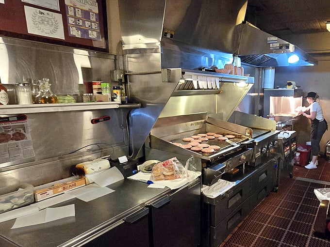 The kitchen where burger magic happens – a glimpse into the engine room of deliciousness that's been perfecting the same recipe for decades.