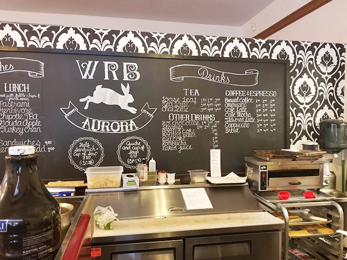 The chalkboard menu with its hand-drawn rabbit logo tells you everything you need to know—this place takes food seriously but itself just seriously enough.