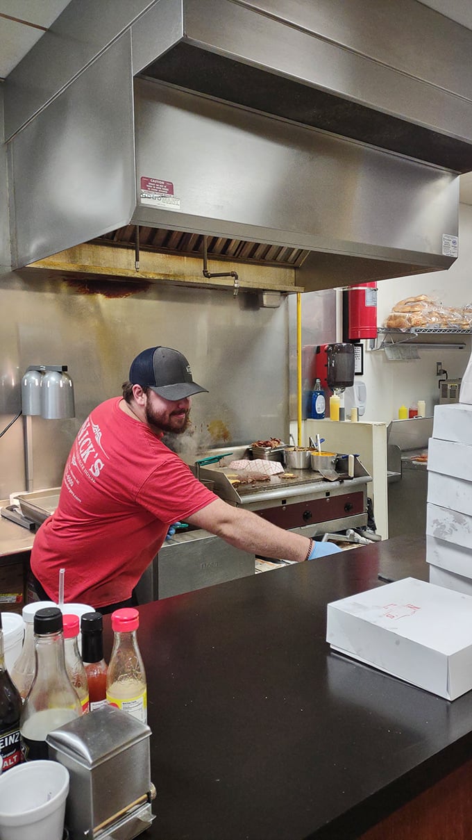 Behind the scenes magic happens on a well-seasoned flat-top grill. This kitchen has probably seen more action than a Hollywood stuntman.