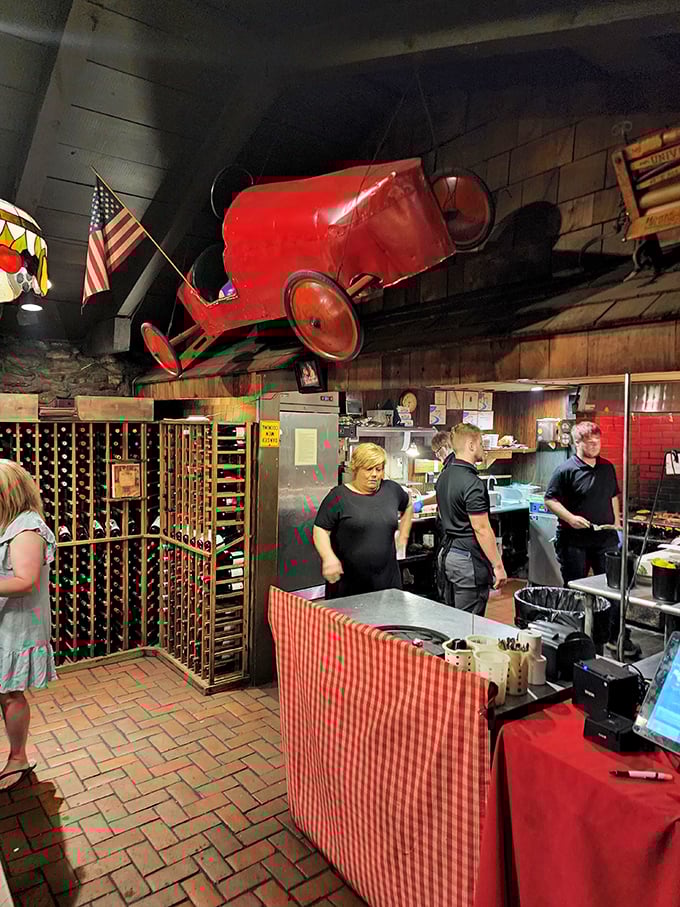 Behind the scenes where the magic happens – the kitchen crew orchestrates the symphony of sizzle that makes The Peddler legendary.