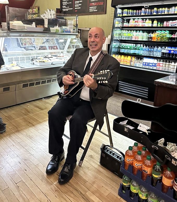 Even the entertainment comes with Italian flair – a mandolin player serenades customers between bites. Music makes the cannoli taste even sweeter.