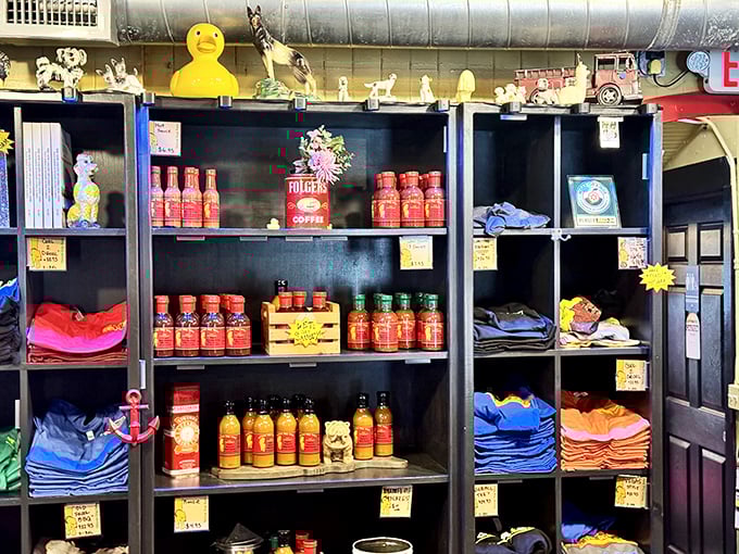 Shelves stocked with house-made sauces and merchandise—because taking a taste of Yellow Dog home isn't just recommended, it's practically mandatory.