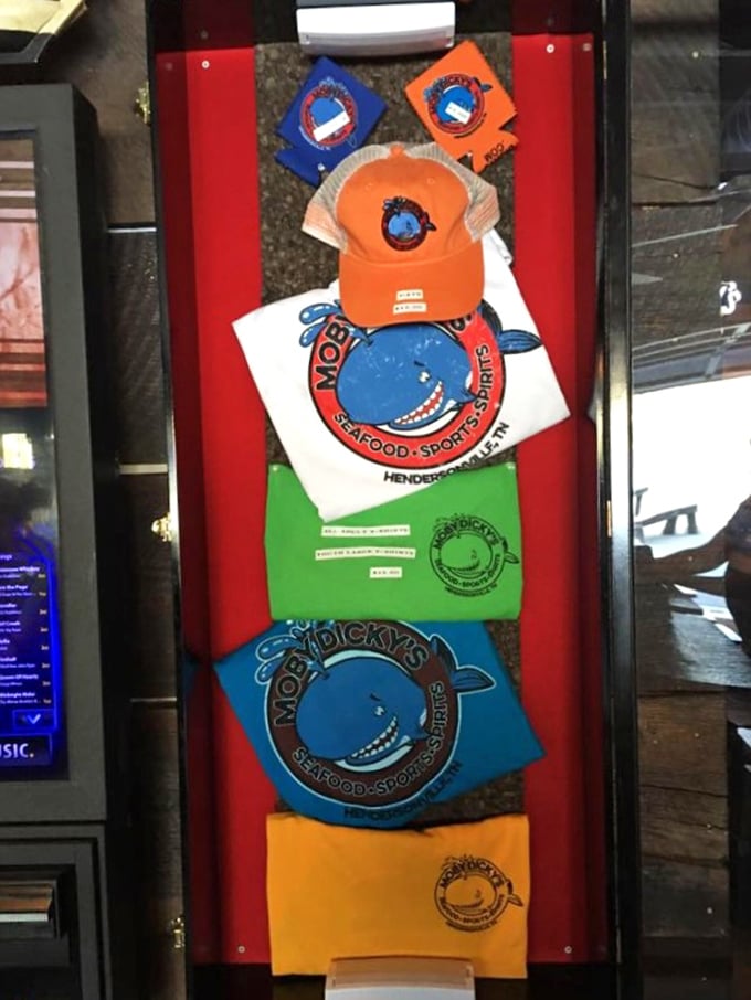 Moby Dickys merchandise displayed like trophies—because when the food's this good, you want a t-shirt to remember it by.