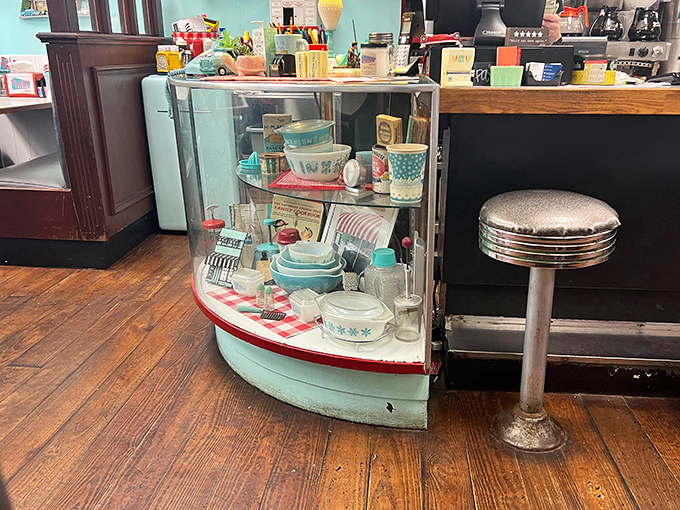 This vintage display case doesn't just showcase merchandise—it's a time capsule of mid-century kitchen aesthetics that makes collectors swoon.