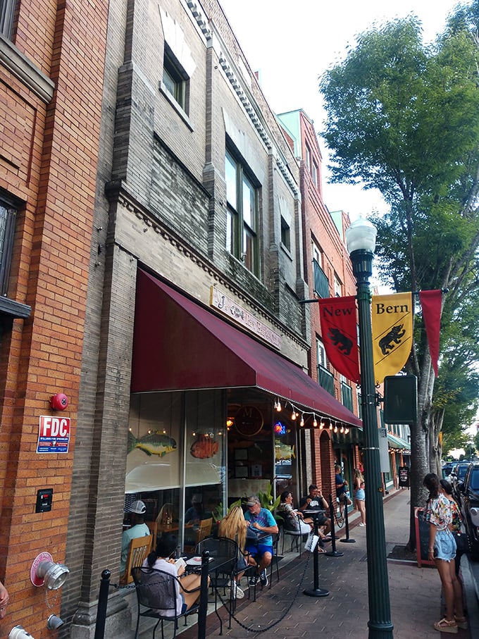 Sidewalk dining in New Bern combines people-watching, fresh air, and local cuisine—the original social networking platform, just with better food.