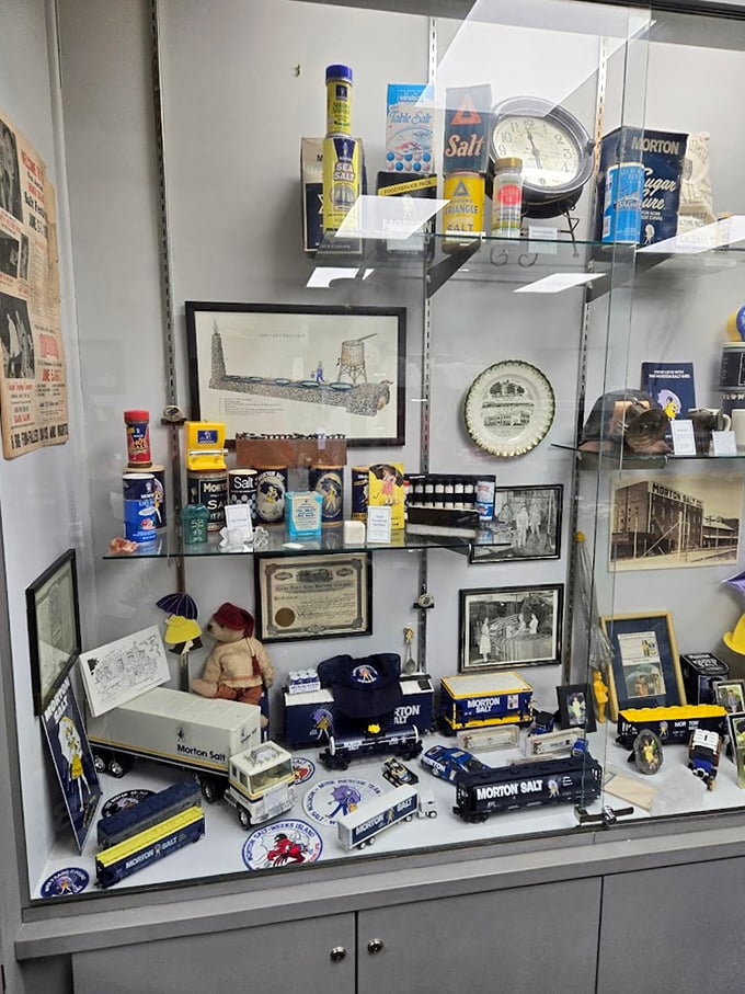 Morton Salt memorabilia fills this display case – tiny trucks carrying tiny salt that made a giant impact on American kitchens.