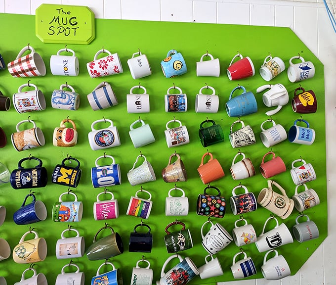 The "Mug Spot" wall—where coffee cups go to become celebrities. Each mug tells a story, much like the diners who've passed through these doors.