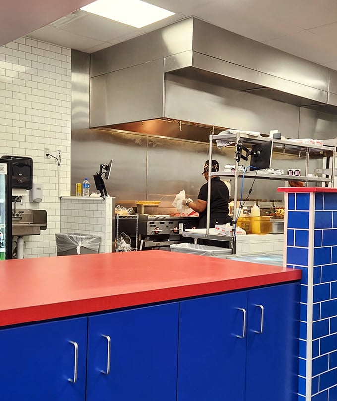 The open kitchen isn't just for show—it's a stage where sandwich artists perform their craft. Every sizzle and flip builds anticipation for what's to come.
