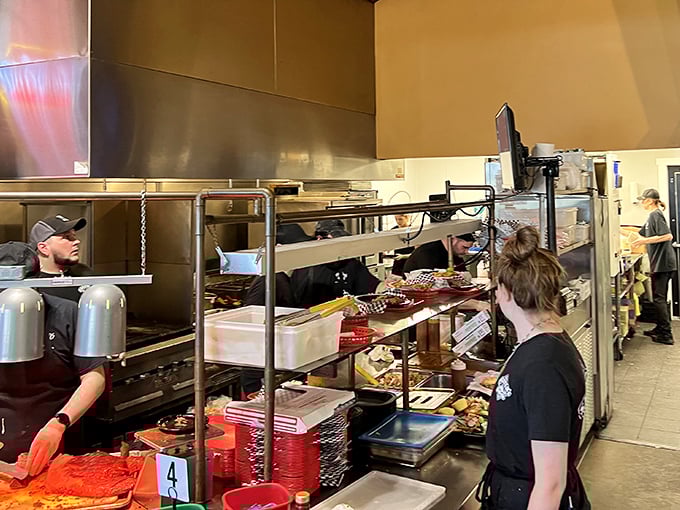 Behind the scenes where smoke meets meat—the kitchen that transforms simple ingredients into complex flavors through time and fire.