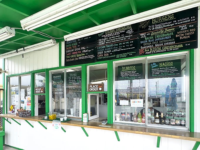 A menu board that reads like a love letter to comfort food—burgers, burritos, and the California-perfect addition of crispy tots to everything.