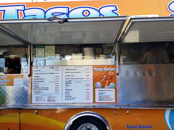 Where the magic happens—this window is the portal between hungry humans and taco nirvana. The staff works with the precision of NASA engineers.