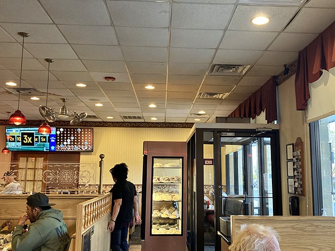 Where dessert dreams come true – that rotating display case is the adult equivalent of a toy store window. Resistance is futile.